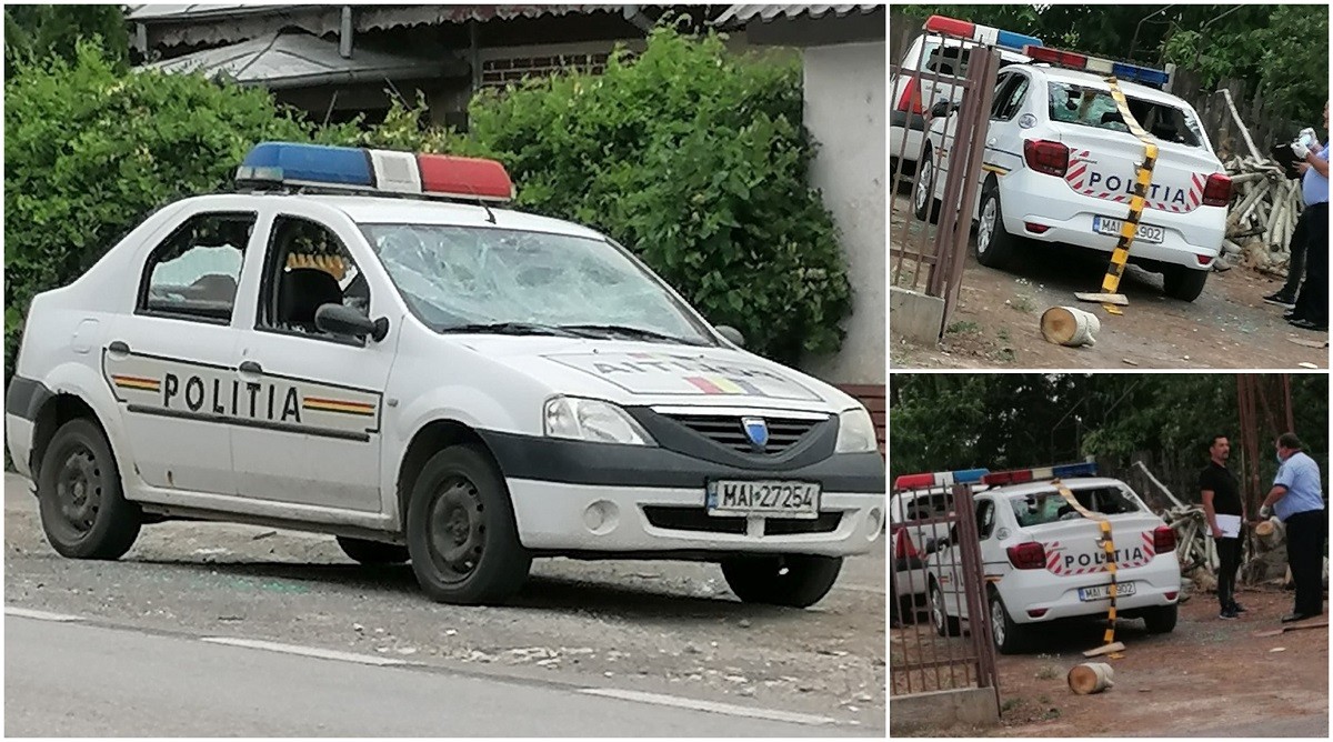 Trei mașini de Poliție distruse cu cazmaua, sub ochii polițiștilor